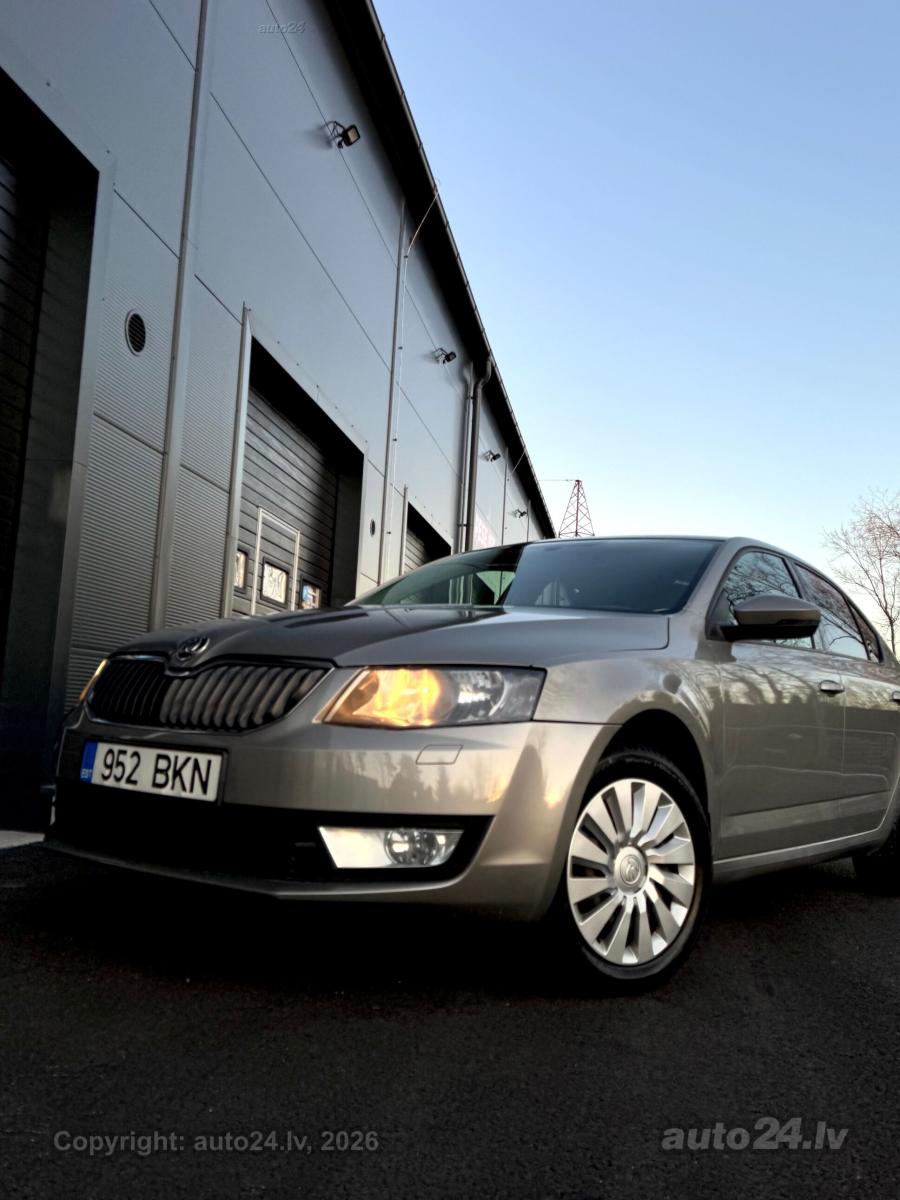 Beige Skoda Octavia 2014 in Tallinn, with an engine capacity of 2.00 L and mileage of 220 thousand km for 6499 €, photo 6 on AUTOMOTO.COM.LV