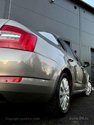 Beige Skoda Octavia 2014 in Tallinn, with an engine capacity of 2.00 L and mileage of 220 thousand km for 6499 €, photo 7 on AUTOMOTO.COM.LV