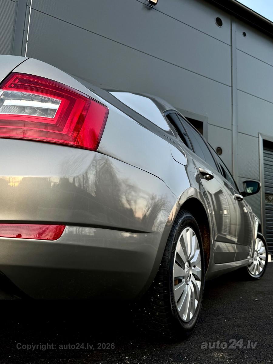 Beige Skoda Octavia 2014 in Tallinn, with an engine capacity of 2.00 L and mileage of 220 thousand km for 6499 €, photo 7 on AUTOMOTO.COM.LV