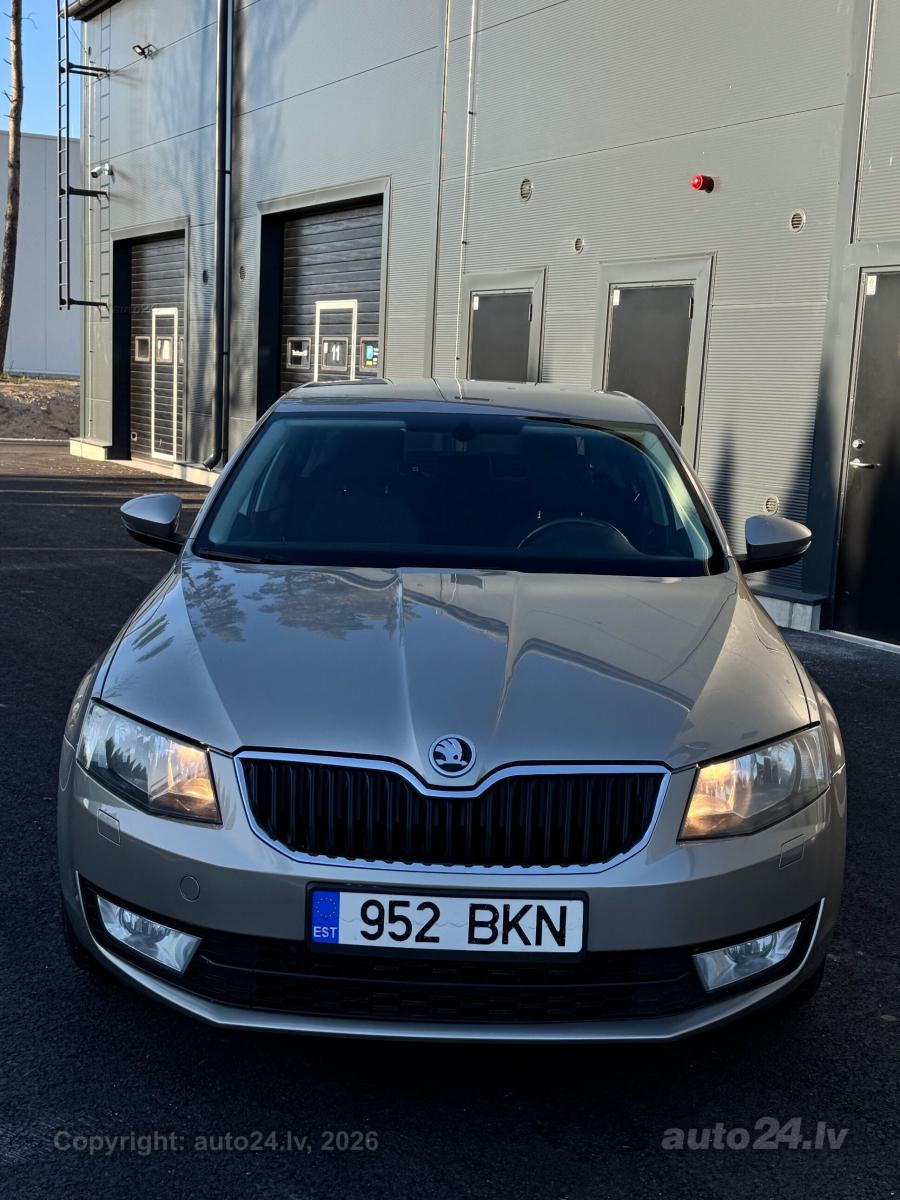 Beige Skoda Octavia 2014 in Tallinn, with an engine capacity of 2.00 L and mileage of 220 thousand km for 6499 €, photo 12 on AUTOMOTO.COM.LV