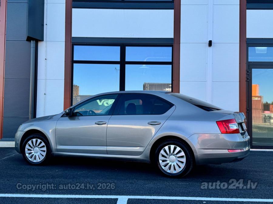 Beige Skoda Octavia 2014 in Tallinn, with an engine capacity of 2.00 L and mileage of 220 thousand km for 6499 €, photo 13 on AUTOMOTO.COM.LV