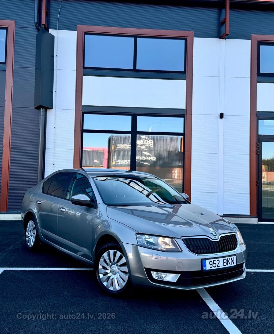 Beige Skoda Octavia 2014 in Tallinn, with an engine capacity of 2.00 L and mileage of 220 thousand km for 6499 €, photo 14 on AUTOMOTO.COM.LV