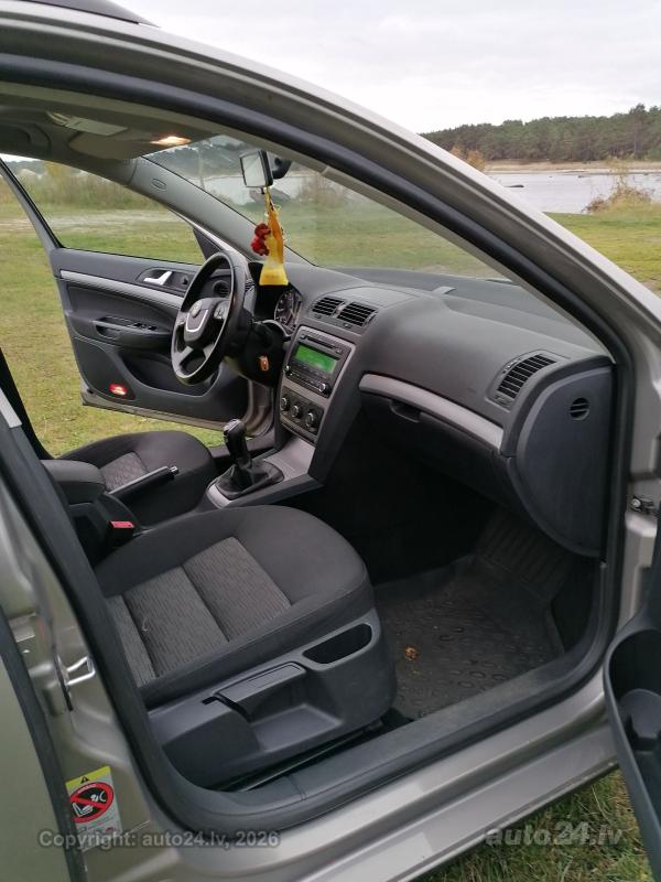 Beige Skoda Octavia 2012 in Tallinn, with an engine capacity of 1.40 L and mileage of 242 thousand km for 3990 €, photo 5 on AUTOMOTO.COM.LV