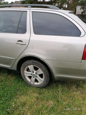 Beige Skoda Octavia 2012 in Tallinn, with an engine capacity of 1.40 L and mileage of 242 thousand km for 3990 €, photo 11 on AUTOMOTO.COM.LV