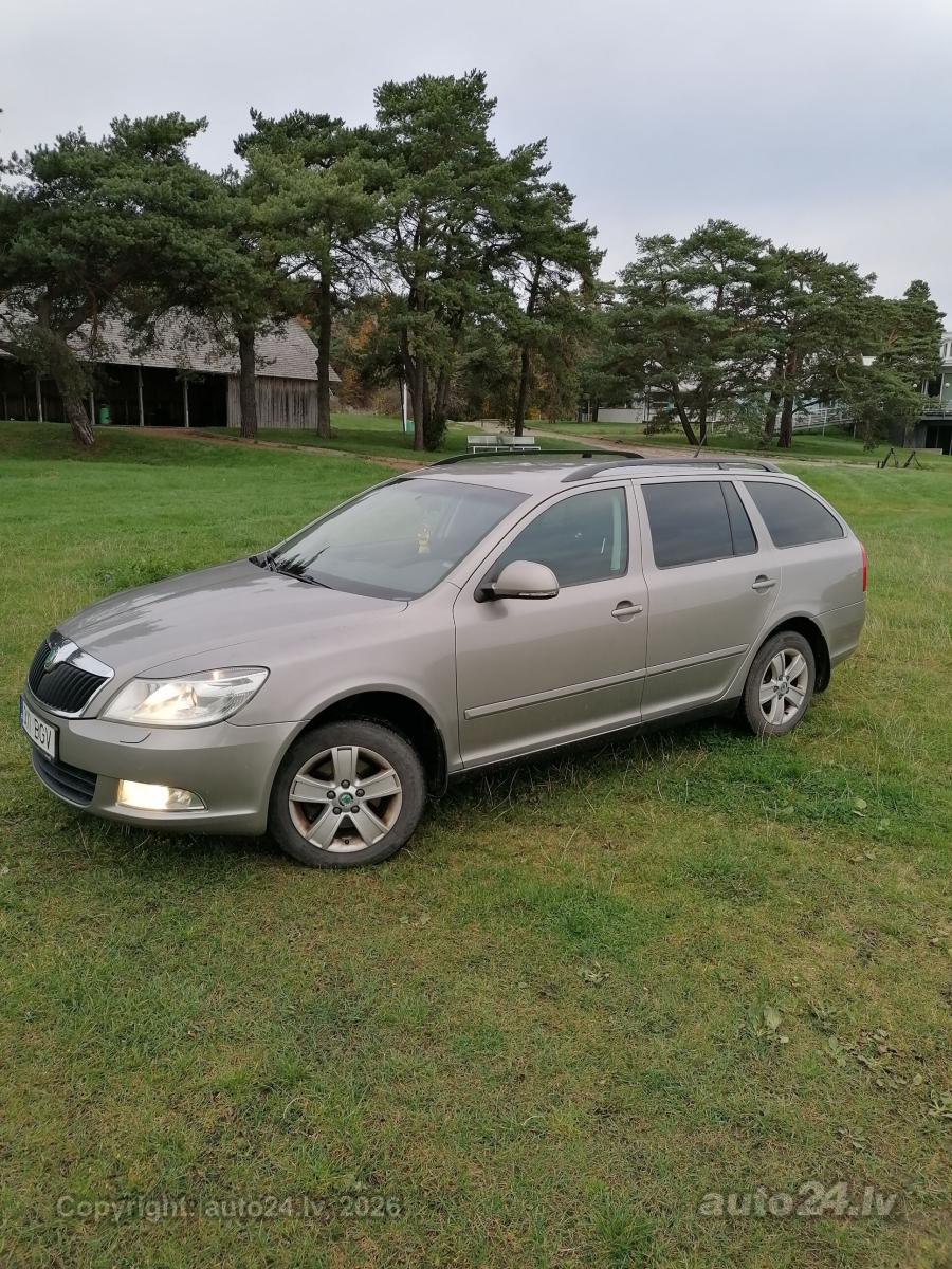 Beige Skoda Octavia 2012 in Tallinn, with an engine capacity of 1.40 L and mileage of 242 thousand km for 3990 €, photo 12 on AUTOMOTO.COM.LV