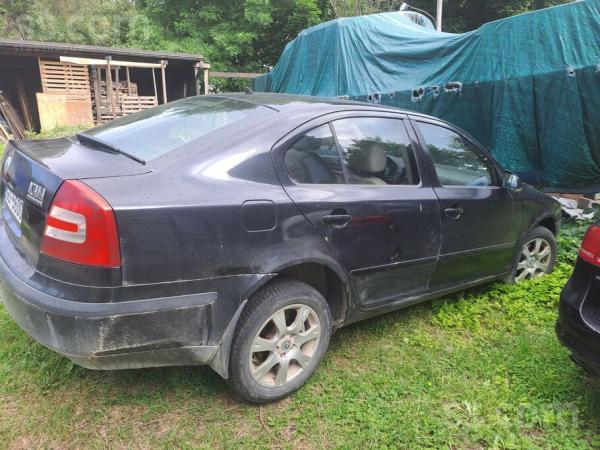 Black Skoda Octavia 2006 in Riga, with an engine capacity of 2.00 L and mileage of 429 thousand km for 1350 €, photo 1 on AUTOMOTO.COM.LV