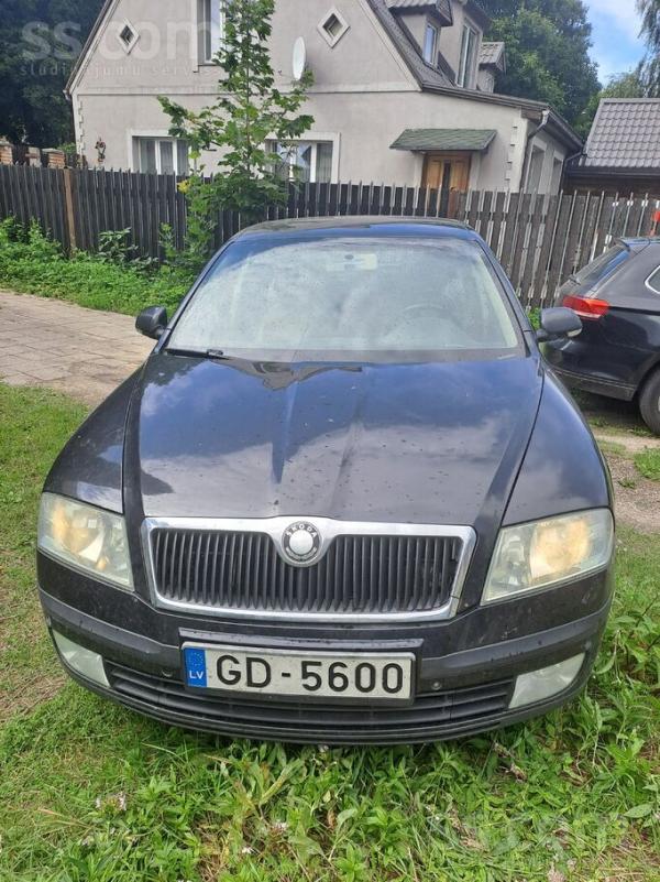 Black Skoda Octavia 2006 in Riga, with an engine capacity of 2.00 L and mileage of 429 thousand km for 1350 €, photo 4 on AUTOMOTO.COM.LV