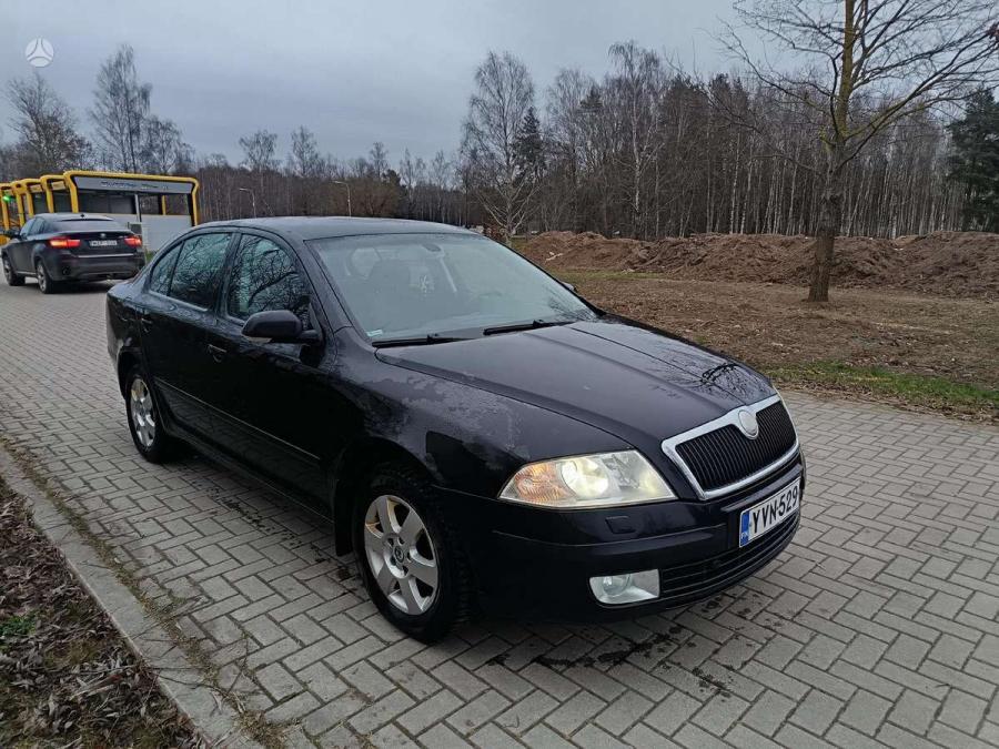 Black Skoda Octavia 2008 in Siauliai, with an engine capacity of 1.90 L and mileage of 292 thousand km for 1499 €, photo 8 on AUTOMOTO.COM.LV