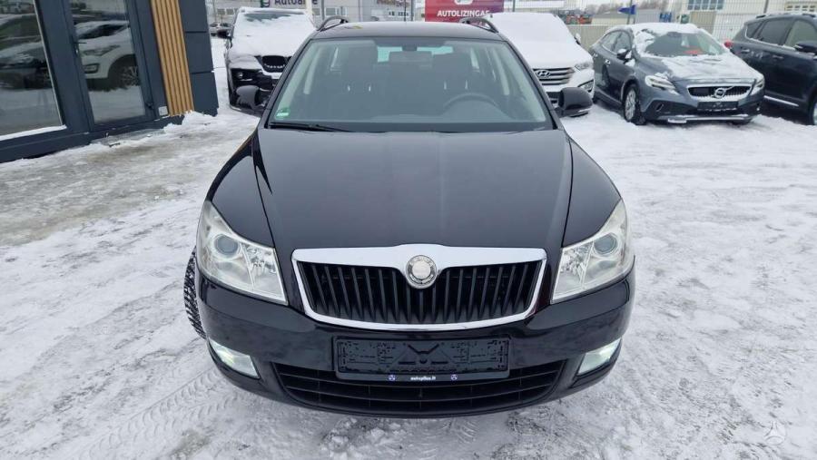 Black Skoda Octavia 2010 in Marijampole, with an engine capacity of 1.97 L and mileage of 297 thousand km for 3650 €, photo 3 on AUTOMOTO.COM.LV