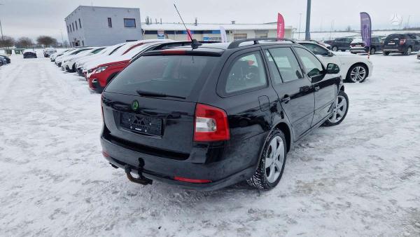 Black Skoda Octavia 2010 in Marijampole, with an engine capacity of 1.97 L and mileage of 297 thousand km for 3650 €, photo 6 on AUTOMOTO.COM.LV