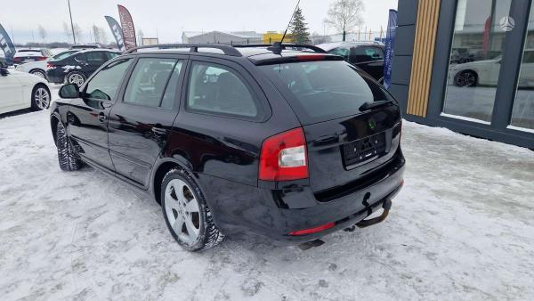 Black Skoda Octavia 2010 in Marijampole, with an engine capacity of 1.97 L and mileage of 297 thousand km for 3650 €, photo 8 on AUTOMOTO.COM.LV