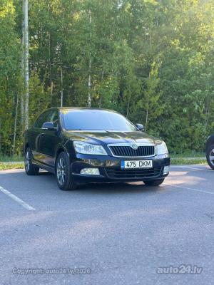 Black Skoda Octavia 2010 in Tallinn, with an engine capacity of 1.60 L and mileage of 318 thousand km for 3500 €, photo  on AUTOMOTO.COM.LV