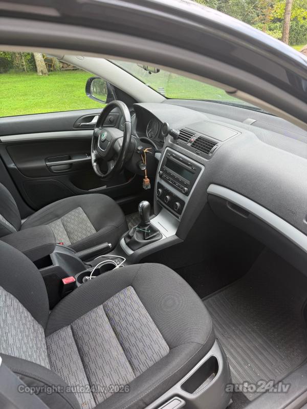 Melns Skoda Octavia 2010 Tallina, ar dzinēja tilpumu 1.60 L un nobraukumu 240 tūkst. km par 1800 €, foto 9 vietnē AUTOMOTO.COM.LV