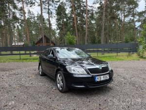 Black Skoda Octavia 2010 in Riga, with an engine capacity of 1.40 L and mileage of 214 thousand km for 3000 €, photo  on AUTOMOTO.COM.LV