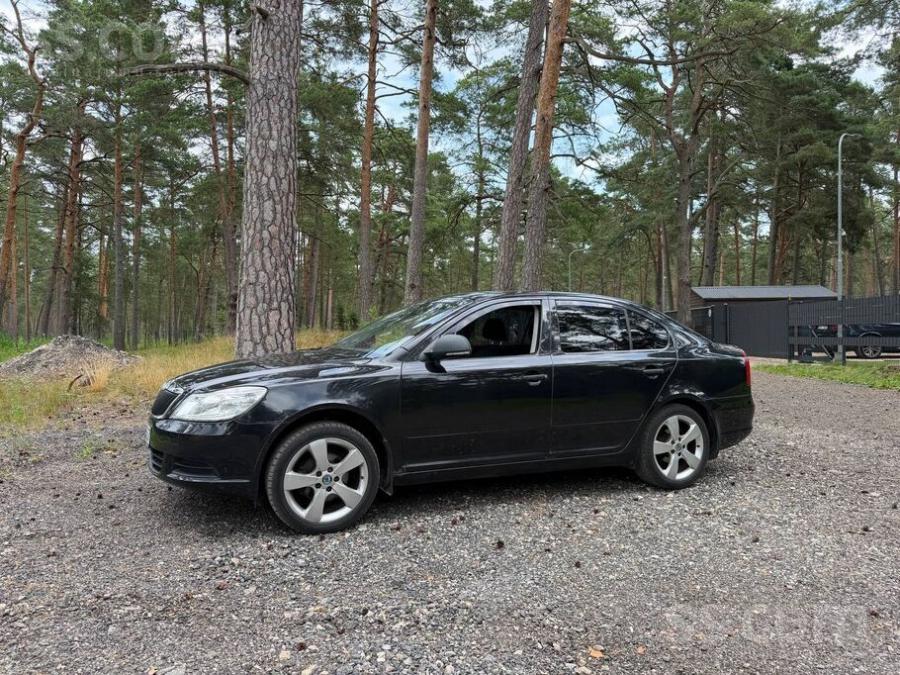 Black Skoda Octavia 2010 in Riga, with an engine capacity of 1.40 L and mileage of 214 thousand km for 3000 €, photo 4 on AUTOMOTO.COM.LV