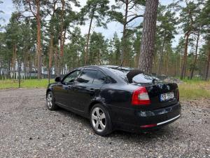 Black Skoda Octavia 2010 in Riga, with an engine capacity of 1.40 L and mileage of 214 thousand km for 3000 €, photo 5 on AUTOMOTO.COM.LV