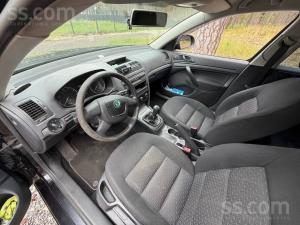 Black Skoda Octavia 2010 in Riga, with an engine capacity of 1.40 L and mileage of 214 thousand km for 3000 €, photo 9 on AUTOMOTO.COM.LV