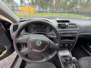 Black Skoda Octavia 2010 in Riga, with an engine capacity of 1.40 L and mileage of 214 thousand km for 3000 €, photo 10 on AUTOMOTO.COM.LV