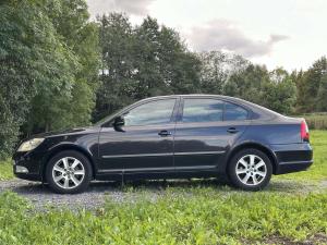 Black Skoda Octavia 2010 in Utena, with an engine capacity of 1.60 L and mileage of 316 thousand km for 3650 €, photo 4 on AUTOMOTO.COM.LV
