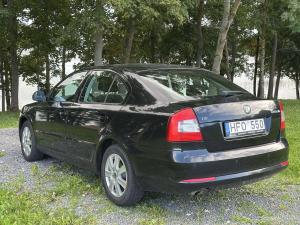 Black Skoda Octavia 2010 in Utena, with an engine capacity of 1.60 L and mileage of 316 thousand km for 3650 €, photo 5 on AUTOMOTO.COM.LV