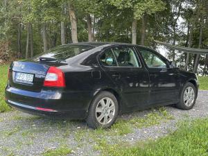 Black Skoda Octavia 2010 in Utena, with an engine capacity of 1.60 L and mileage of 316 thousand km for 3650 €, photo 6 on AUTOMOTO.COM.LV