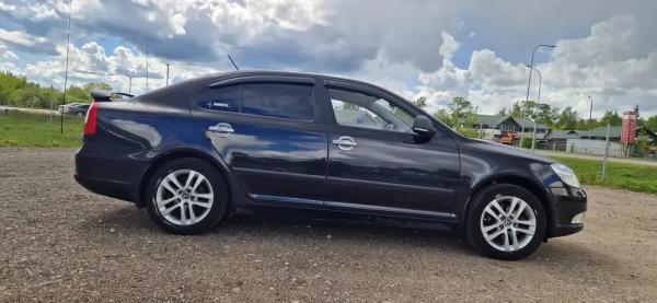 Black Skoda Octavia 2011 in Daugavpils, with an engine capacity of 1.20 L and mileage of 167 thousand km for 2750 €, photo 6 on AUTOMOTO.COM.LV