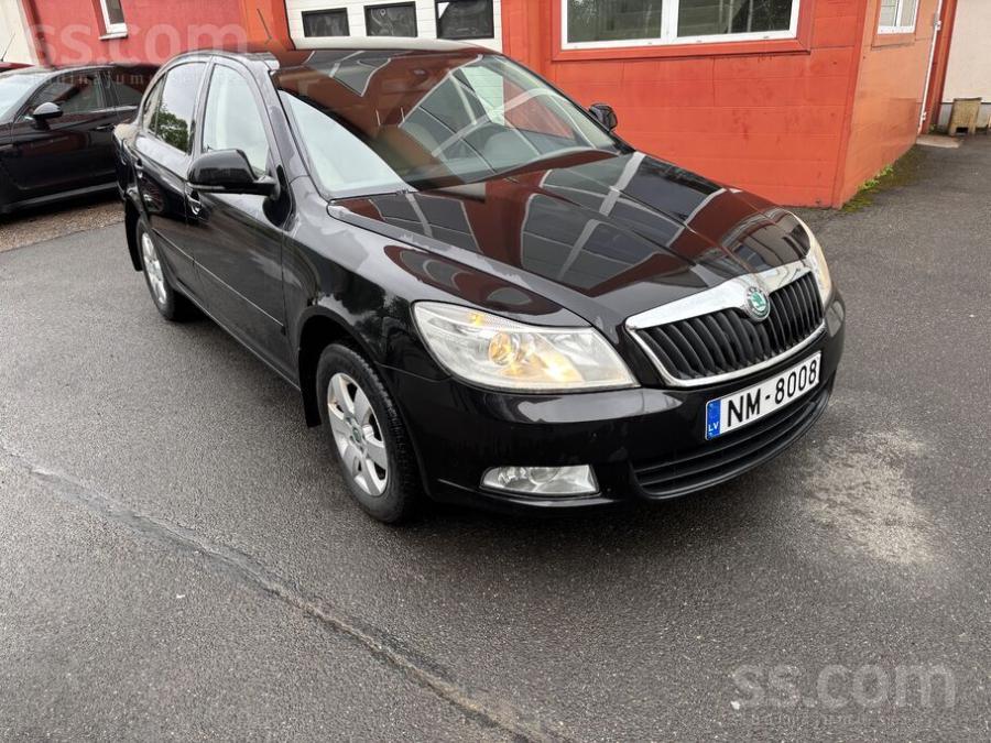 Melns Skoda Octavia 2012 Rīga, ar dzinēja tilpumu 2.00 L un nobraukumu 207 tūkst. km par 3900 €, foto 2 vietnē AUTOMOTO.COM.LV