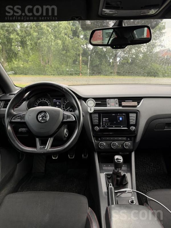 Black Skoda Octavia 2015 in Riga, with an engine capacity of 2.00 L and mileage of 302 thousand km for 9900 €, photo 5 on AUTOMOTO.COM.LV