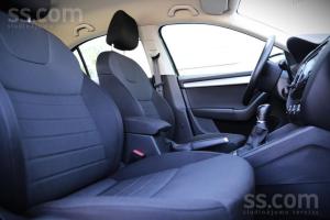 Black Skoda Octavia 2016 in Riga, with an engine capacity of 1.40 L and mileage of 159 thousand km for 7495 €, photo 14 on AUTOMOTO.COM.LV