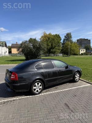 Black Skoda Octavia 2007 in Riga, with an engine capacity of 2.00 L and mileage of 225 thousand km for 2000 €, photo 4 on AUTOMOTO.COM.LV