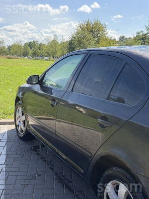 Black Skoda Octavia 2007 in Riga, with an engine capacity of 2.00 L and mileage of 225 thousand km for 2000 €, photo 8 on AUTOMOTO.COM.LV