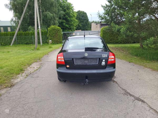Melns Skoda Octavia 2009 Vilkaviškis, ar dzinēja tilpumu 1.60 L un nobraukumu 200 tūkst. km par 2500 €, foto 8 vietnē AUTOMOTO.COM.LV