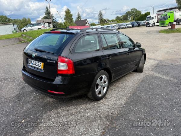 Black Skoda Octavia 2009 in Tallinn, with an engine capacity of 1.90 L and mileage of 252 thousand km for 4490 €, photo 6 on AUTOMOTO.COM.LV
