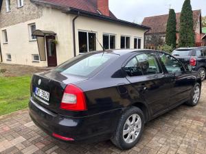 Black Skoda Octavia 2010 in Riga, with an engine capacity of 1.20 L and mileage of 199 thousand km for 1800 €, photo 4 on AUTOMOTO.COM.LV