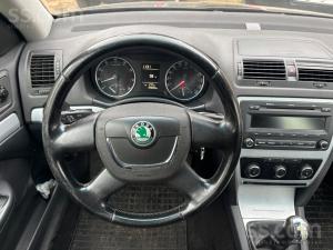 Black Skoda Octavia 2010 in Riga, with an engine capacity of 1.20 L and mileage of 199 thousand km for 1800 €, photo 8 on AUTOMOTO.COM.LV