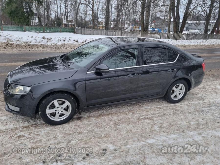 Black Skoda Octavia 2013 in Polva, with an engine capacity of 2.00 L and mileage of 289 thousand km for 5090 €, photo 15 on AUTOMOTO.COM.LV
