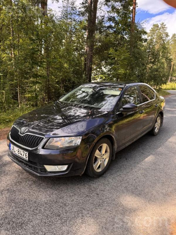 Black Skoda Octavia 2014 in Riga, with an engine capacity of 2.00 L and mileage of 287 thousand km for 3350 €, photo 1 on AUTOMOTO.COM.LV
