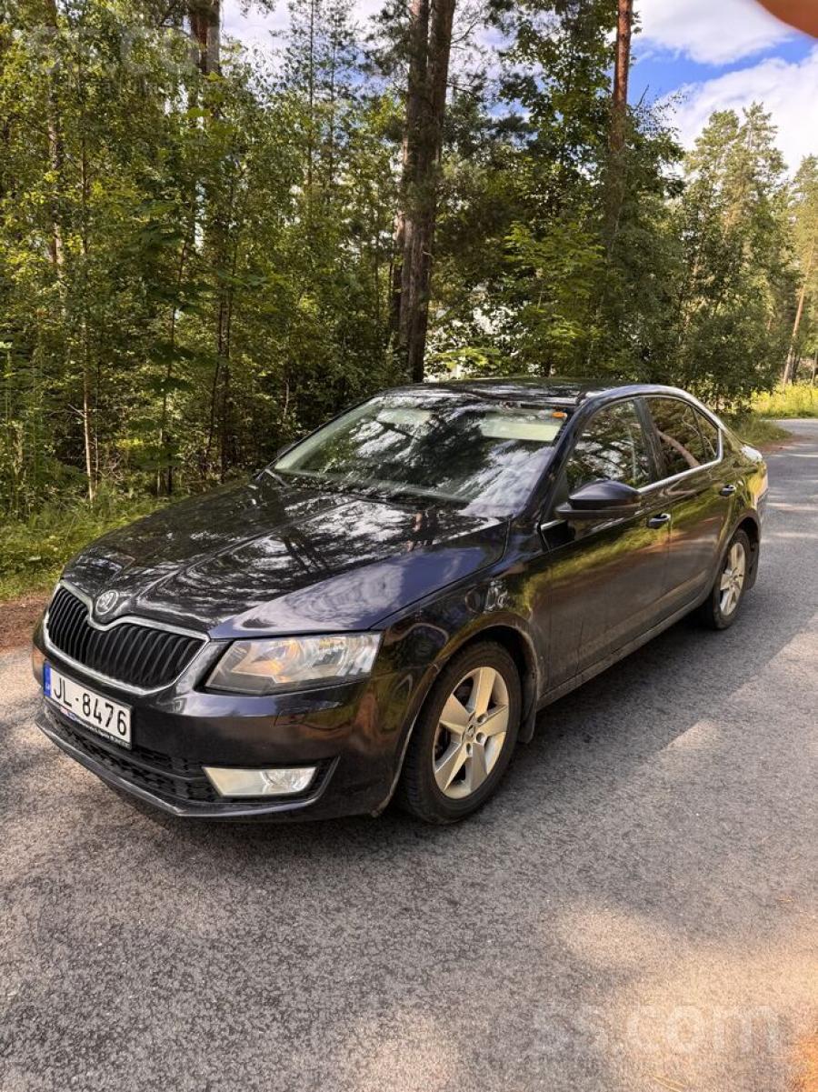 Black Skoda Octavia 2014 in Riga, with an engine capacity of 2.00 L and mileage of 287 thousand km for 3350 €, photo 1 on AUTOMOTO.COM.LV