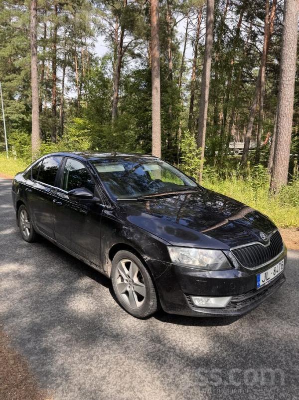 Black Skoda Octavia 2014 in Riga, with an engine capacity of 2.00 L and mileage of 287 thousand km for 3350 €, photo 2 on AUTOMOTO.COM.LV