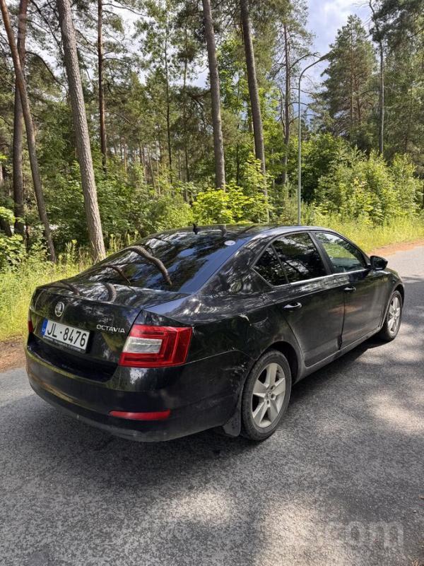Black Skoda Octavia 2014 in Riga, with an engine capacity of 2.00 L and mileage of 287 thousand km for 3350 €, photo 4 on AUTOMOTO.COM.LV