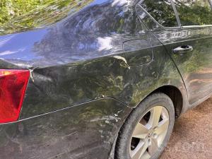 Black Skoda Octavia 2014 in Riga, with an engine capacity of 2.00 L and mileage of 287 thousand km for 3350 €, photo 10 on AUTOMOTO.COM.LV