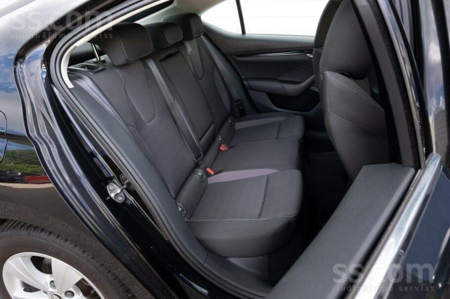 Black Skoda Octavia 2022 in Riga, with an engine capacity of 1.00 L and mileage of 101 thousand km for 14950 €, photo 9 on AUTOMOTO.COM.LV