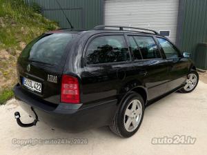 Black Skoda Octavia 2004 in Viljandi, with an engine capacity of 1.90 L and mileage of 318 thousand km for 3790 €, photo 3 on AUTOMOTO.COM.LV