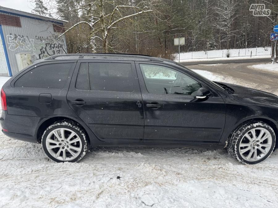 Melns Skoda Octavia 2006 Viļņa, ar dzinēja tilpumu 2.00 L un nobraukumu 317 tūkst. km par 2499 €, foto 5 vietnē AUTOMOTO.COM.LV
