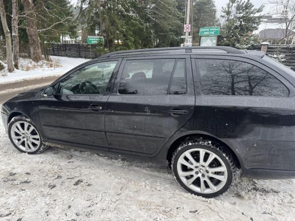 Black Skoda Octavia 2006 in Vilnius, with an engine capacity of 2.00 L and mileage of 317 thousand km for 2499 €, photo 9 on AUTOMOTO.COM.LV