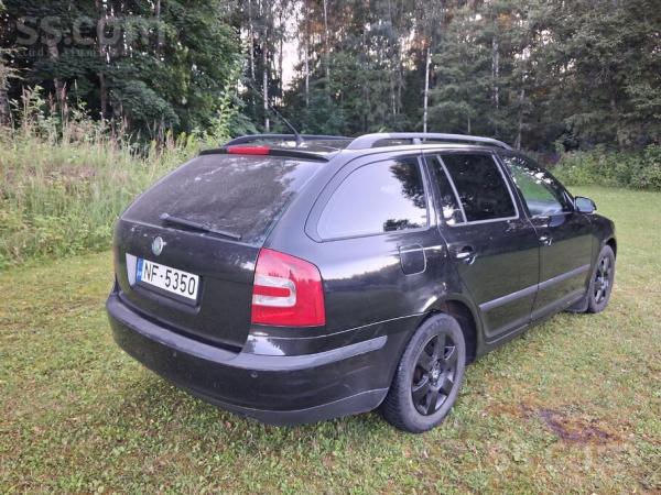 Black Skoda Octavia 2006 in Preili, with an engine capacity of 2.00 L and mileage of 329 thousand km for 1550 €, photo 5 on AUTOMOTO.COM.LV