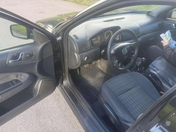 Melns Skoda Octavia 2006 Viļņa, ar dzinēja tilpumu 1.90 L un nobraukumu 400 tūkst. km par 600 €, foto 3 vietnē AUTOMOTO.COM.LV