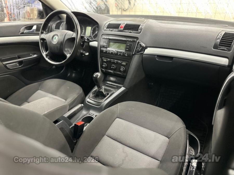 Melns Skoda Octavia 2007 Tallina, ar dzinēja tilpumu 2.00 L un nobraukumu 464 tūkst. km par 1300 €, foto 8 vietnē AUTOMOTO.COM.LV