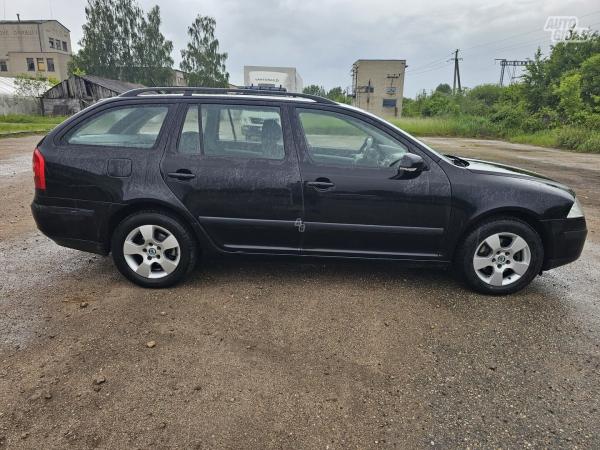 Melns Skoda Octavia 2007 Viļņa, ar dzinēja tilpumu 2.00 L un nobraukumu 350 tūkst. km par 2650 €, foto 4 vietnē AUTOMOTO.COM.LV