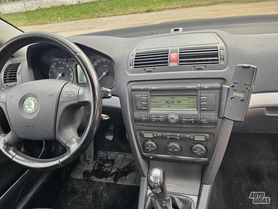 Black Skoda Octavia 2007 in Vilnius, with an engine capacity of 2.00 L and mileage of 350 thousand km for 2650 €, photo 12 on AUTOMOTO.COM.LV
